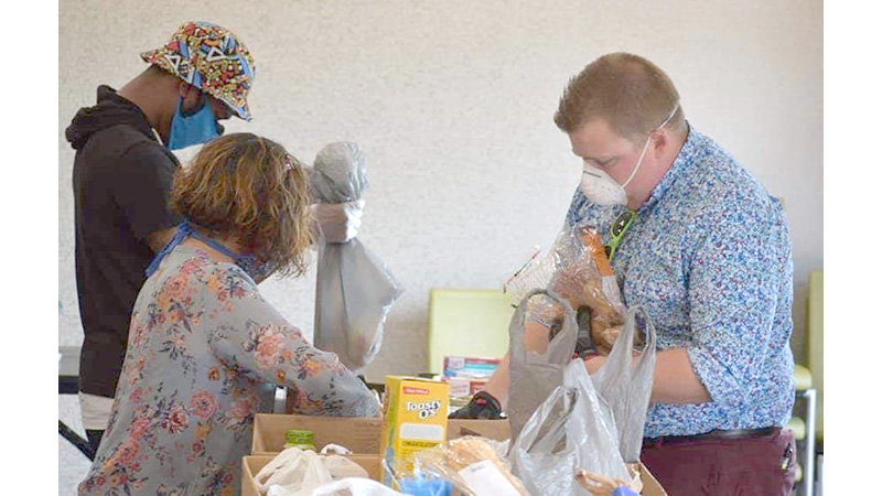 Group feeds 70 area families - Farmville | Farmville